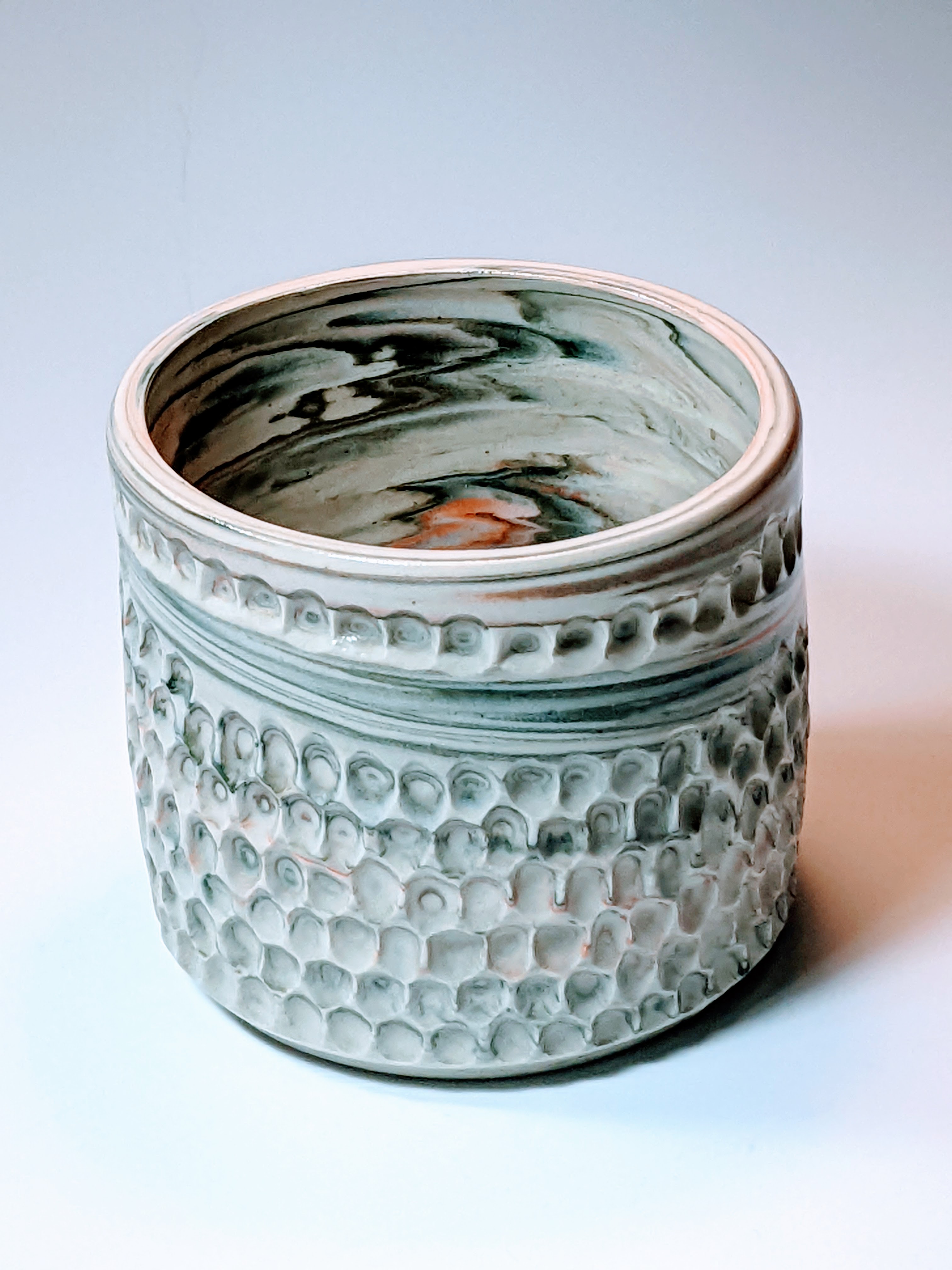 Hand facetted marbled beaker - pj pottery