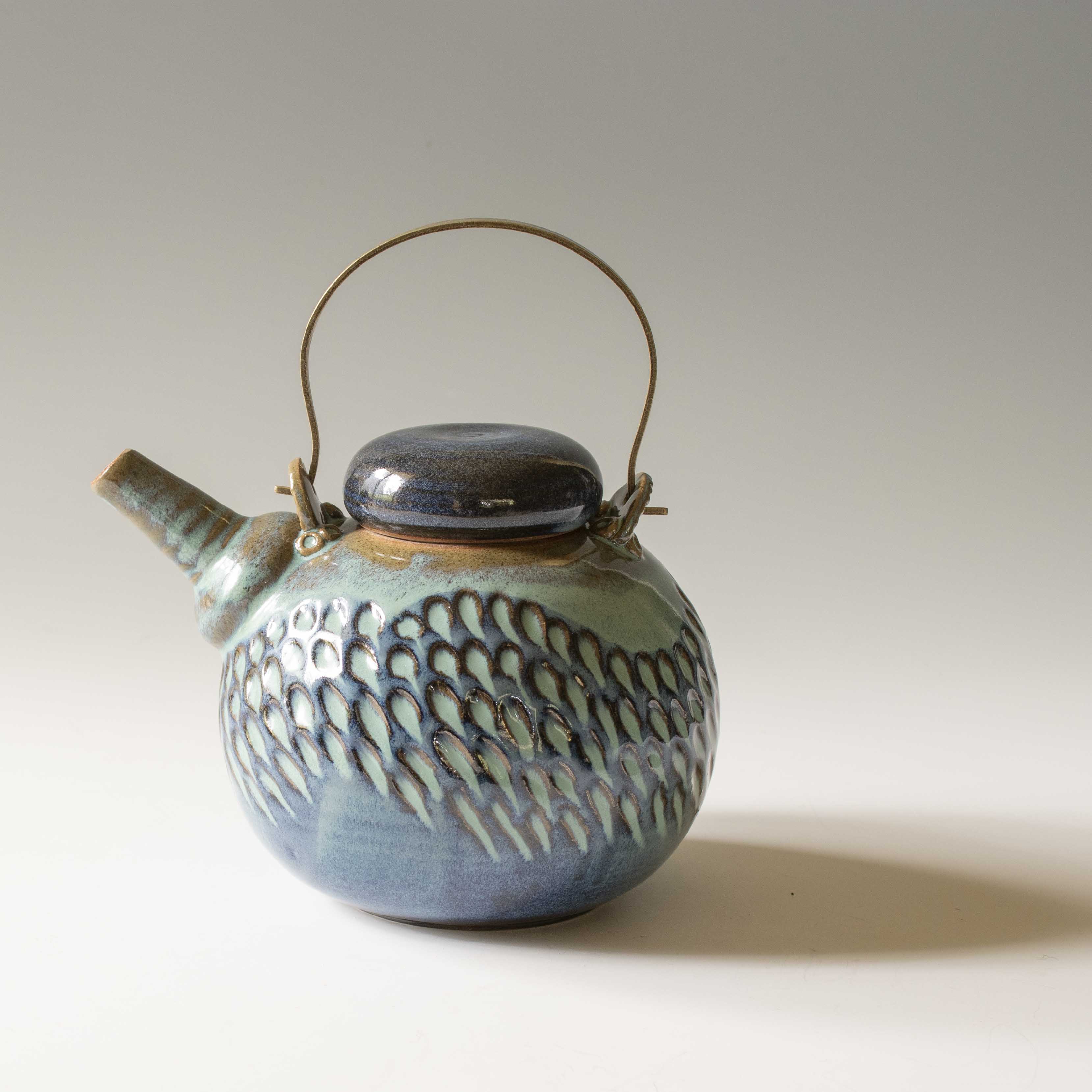 Turquoise faceted teapot