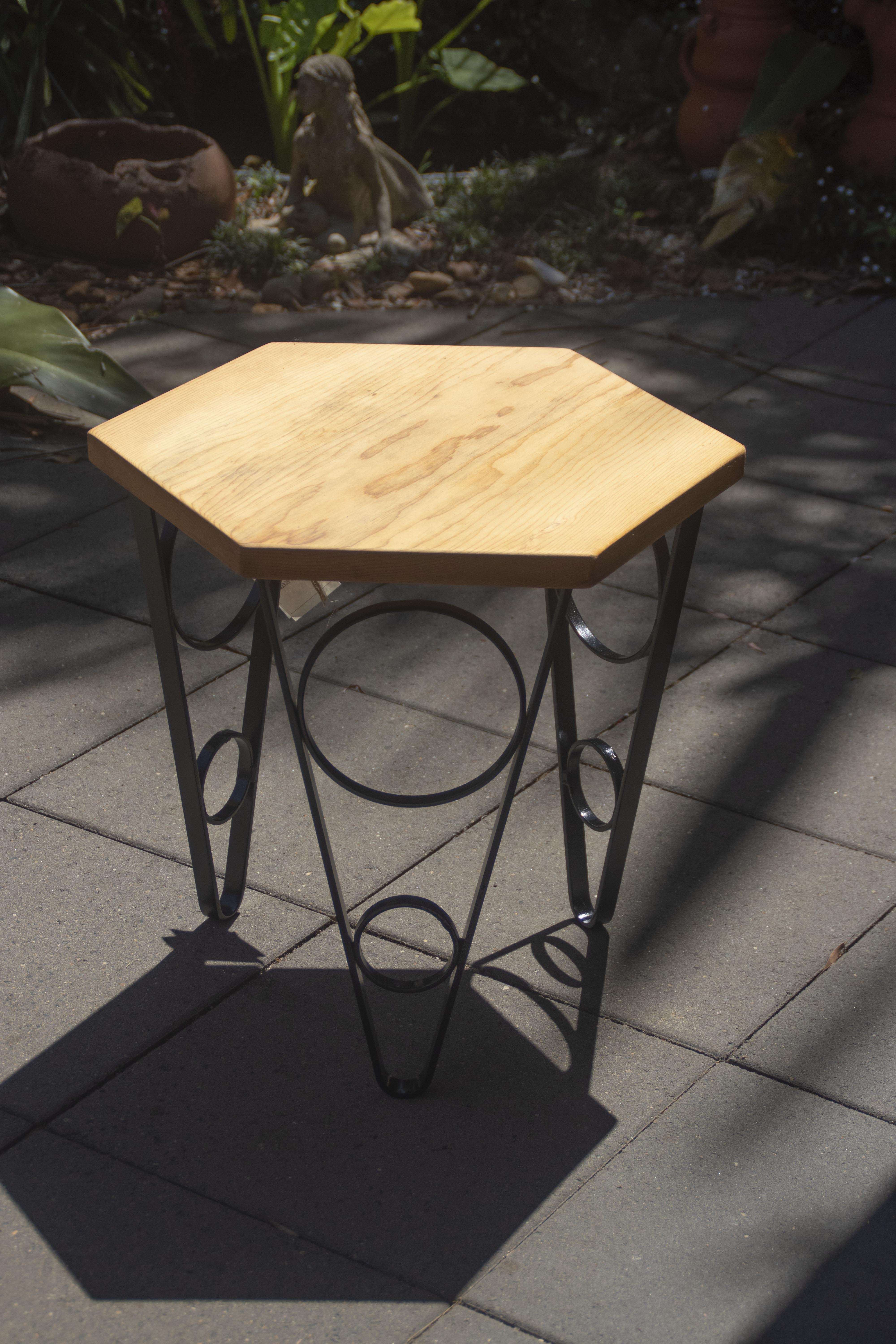 Wrought iron table with timber top
